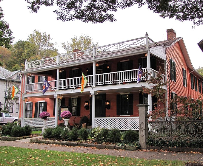 The Buxton Inn's distinctive red exterior and double-decker porches have been welcoming travelers since long before GPS told us where to turn.