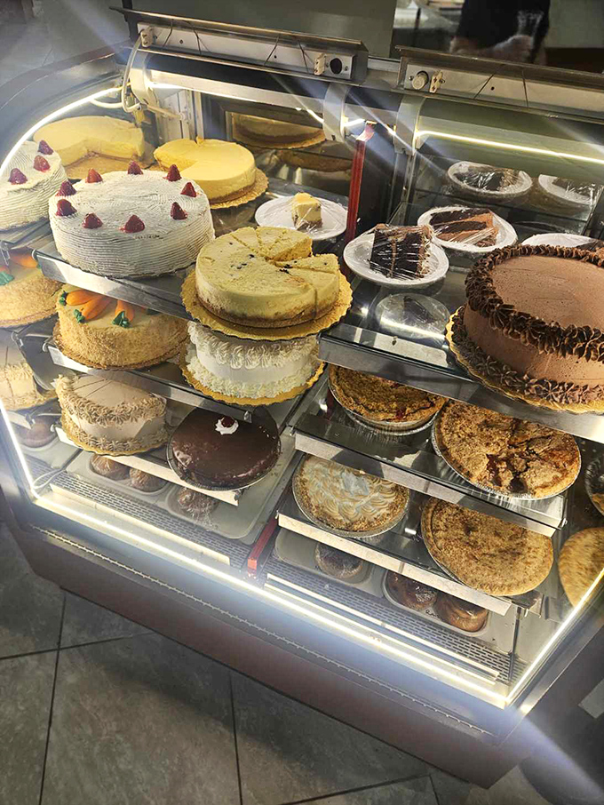 The cake display case&mdash;where diet plans go to die and birthday resolutions are born. Worth every glorious calorie.