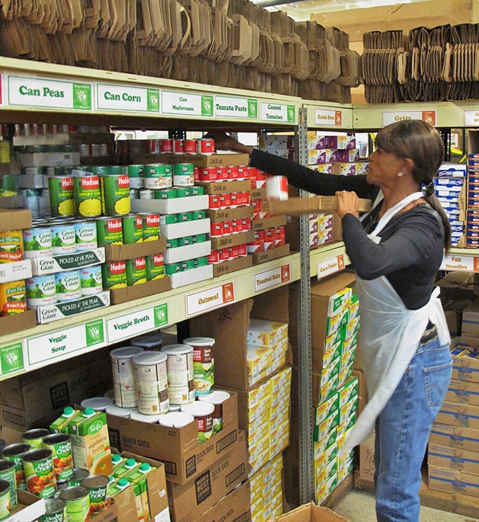 Organized chaos of canned possibilities. Behind every label lies a meal waiting to happen for someone who needs it most.