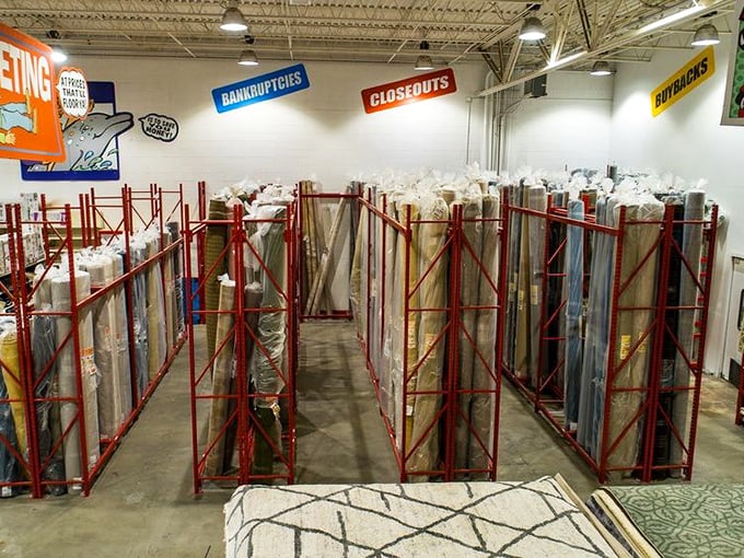 The carpet section: where floor coverings stand like soldiers in formation, waiting to transform your home without transforming your bank account.