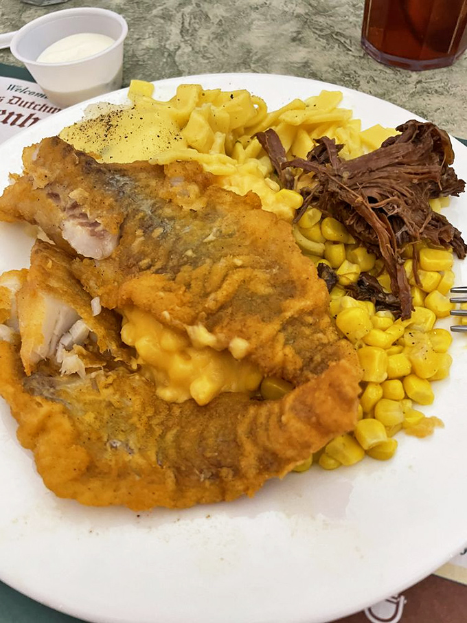 Golden-fried catfish meets buttery noodles and sweet corn in a plate that's essentially Indiana's answer to coastal seafood towers.