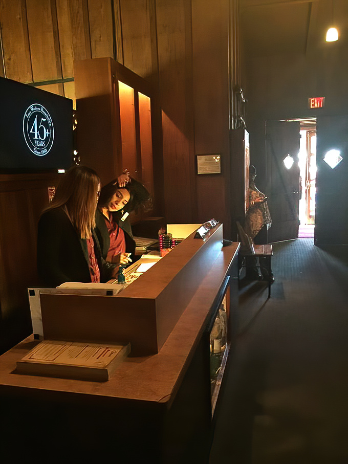 The check-in area – where hungry patrons transition from the outside world to a realm of sizzling steaks and hearty laughter.