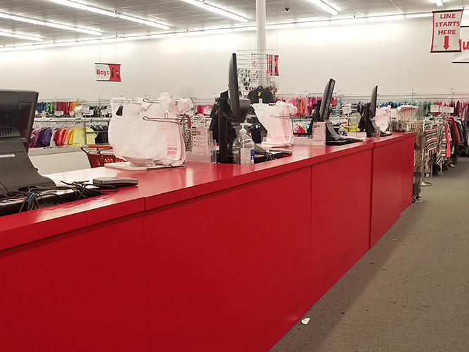 The finish line for treasure hunters. That bright red checkout counter has witnessed countless "You'll never believe what I found!" moments.