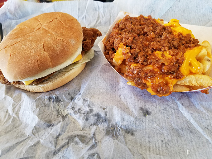 Lunch of champions: a perfectly proportioned chicken sandwich meets its soulmate&mdash;chili cheese fries that require both fork and commitment.