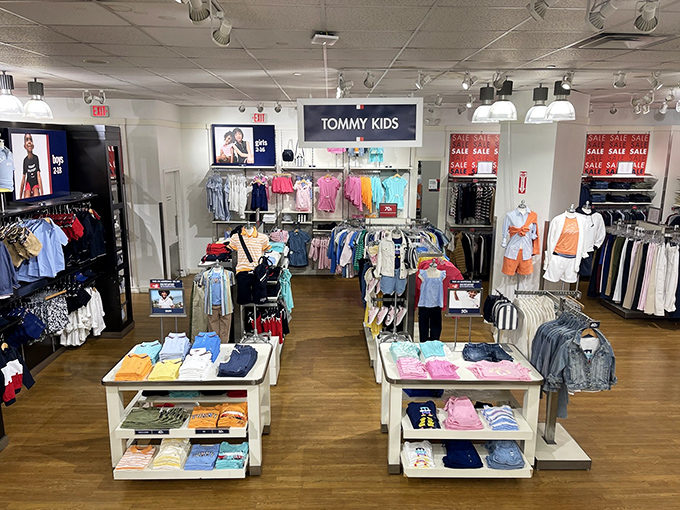 Tommy Kids offers a miniature fashion runway where parents battle the eternal question: "Will they outgrow this before they even wear it?"