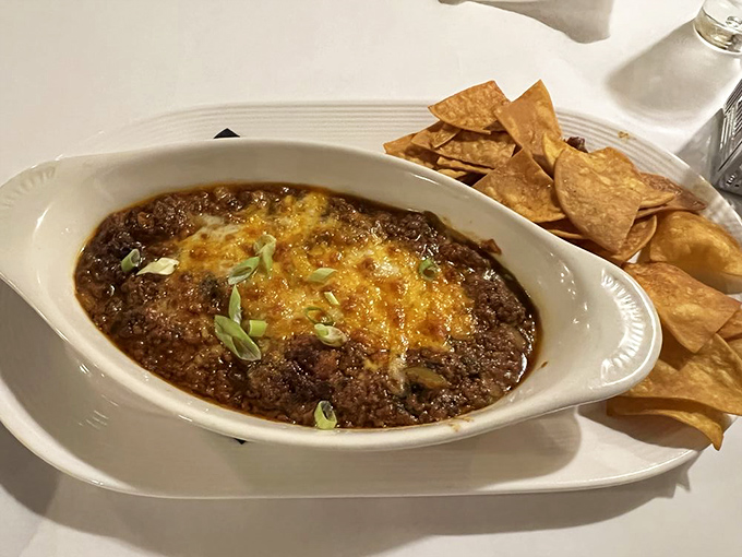 This bubbling cauldron of cheesy chorizo dip doesn't just satisfy hunger&mdash;it creates happiness. The kind of appetizer that makes the table fall silent.