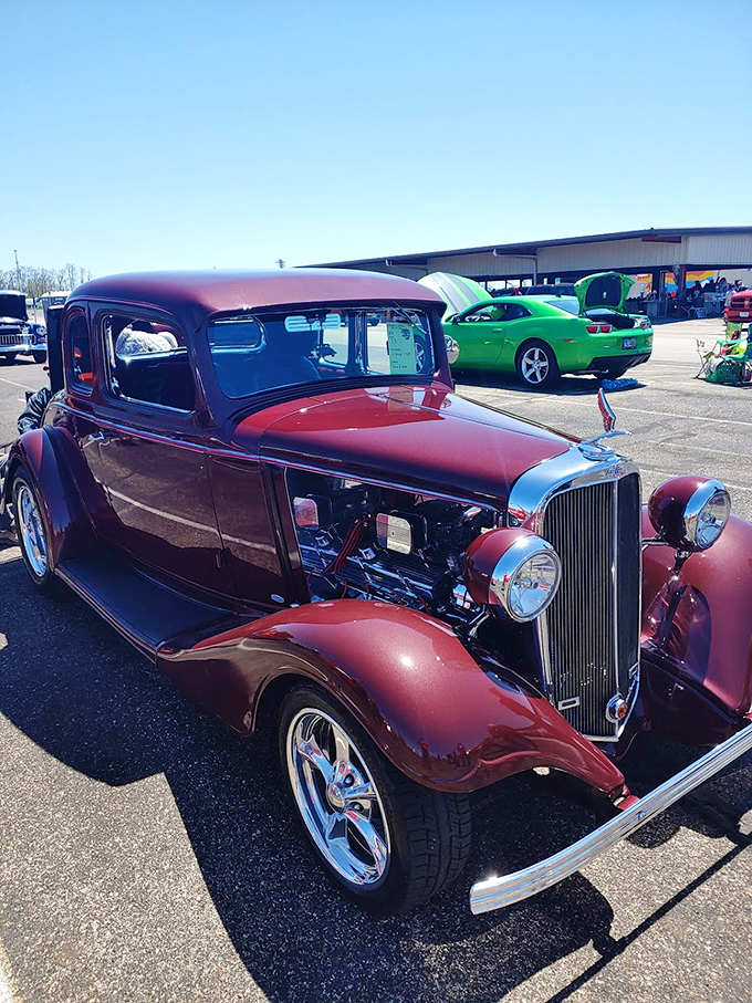 Detroit's golden era gleams in this cherry-red beauty. This meticulously restored classic isn't just a car&mdash;it's a time machine on chrome wheels.