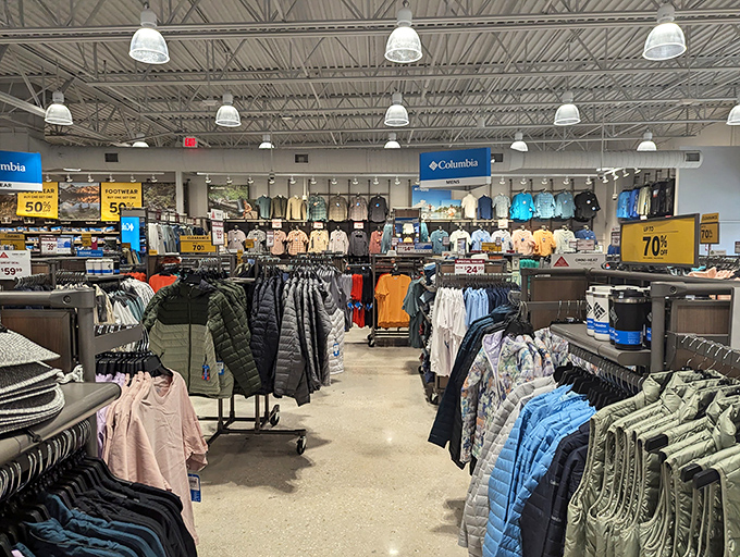 Columbia's store layout—where Florida visitors ironically buy gear designed to protect from elements they're vacationing to enjoy.