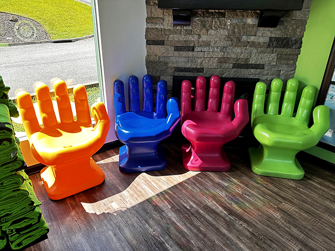 These whimsical hand-shaped chairs perfectly capture the park's philosophy: life's too short not to sit on something ridiculous occasionally.