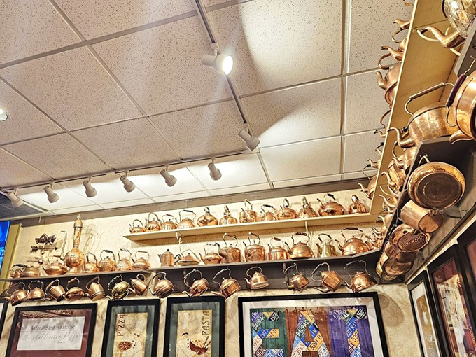 Copper kettles line the walls like trophies, silent witnesses to decades of simmering sauces and the occasional heated kitchen debate.