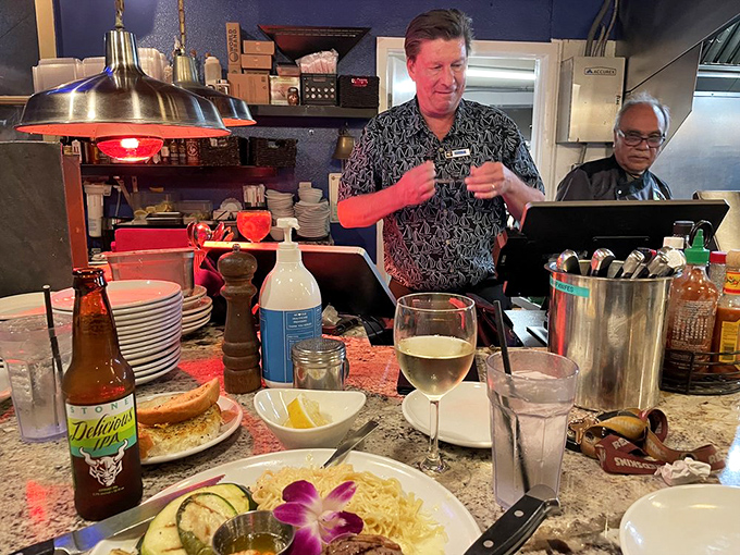 At this counter, culinary dreams come true as chefs work their maritime magic just feet away from eager diners.