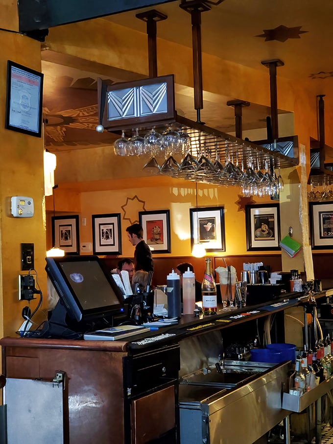 Behind the counter, organized chaos produces liquid magic—where milkshakes and boozy concoctions are born with equal care.