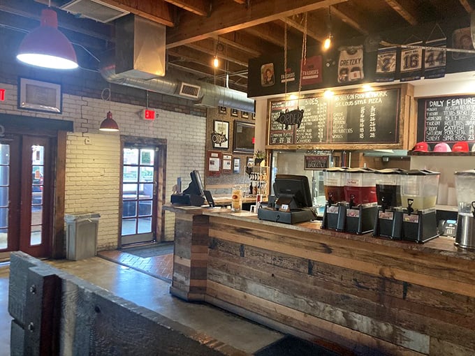 Behind this rustic wooden counter, smoke wizards transform ordinary meat into extraordinary barbecue. The magic happens behind the scenes.
