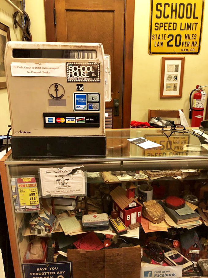 An old-fashioned cash register surrounded by vintage school supplies &ndash; even checkout feels like stepping back in time here.