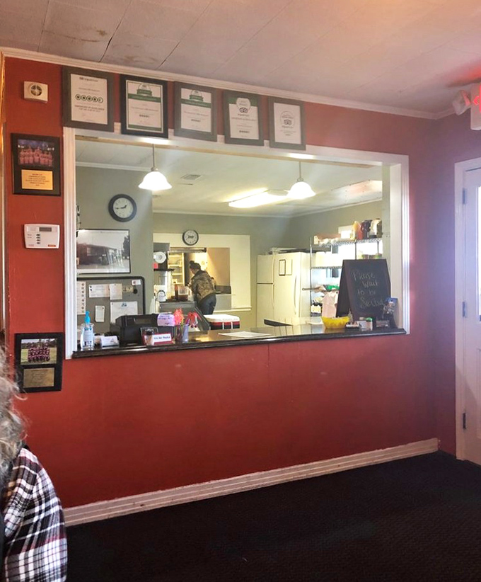 Behind this window is where the magic happens&mdash;no fancy chef's table needed when the food speaks volumes without the theatrics.