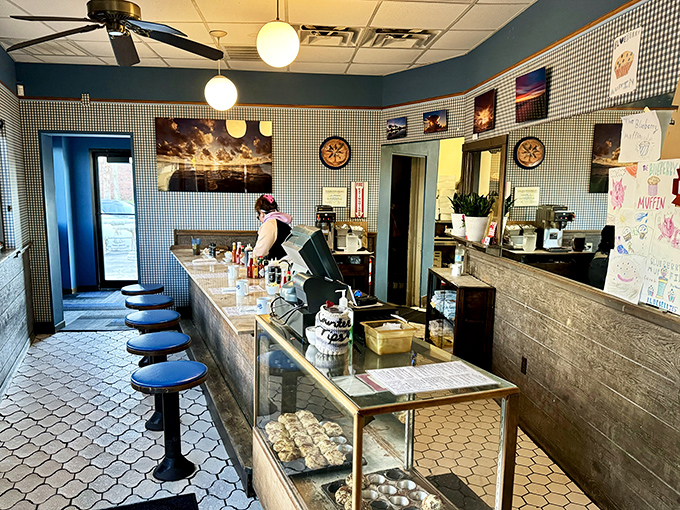 Where breakfast dreams begin their journey to reality. That display case is basically a museum of morning masterpieces.