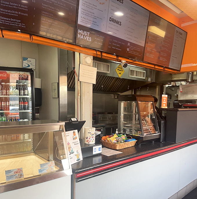 The open kitchen concept isn't about trendy transparency &ndash; it's about watching your comfort food dreams materialize in real time.