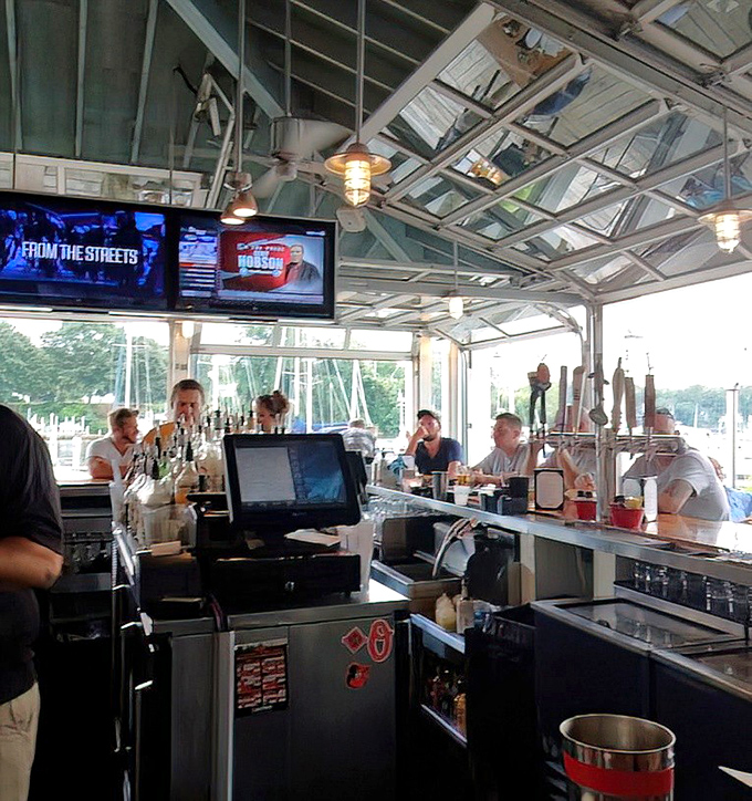 Where maritime meets modern &ndash; the bar area balances nautical charm with enough TVs to keep you updated on the Orioles game.