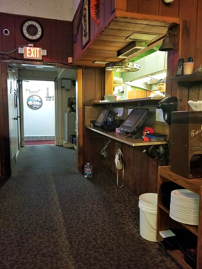 Behind the scenes where seafood magic happens. No fancy equipment, just well-worn tools that know how to treat fish right.