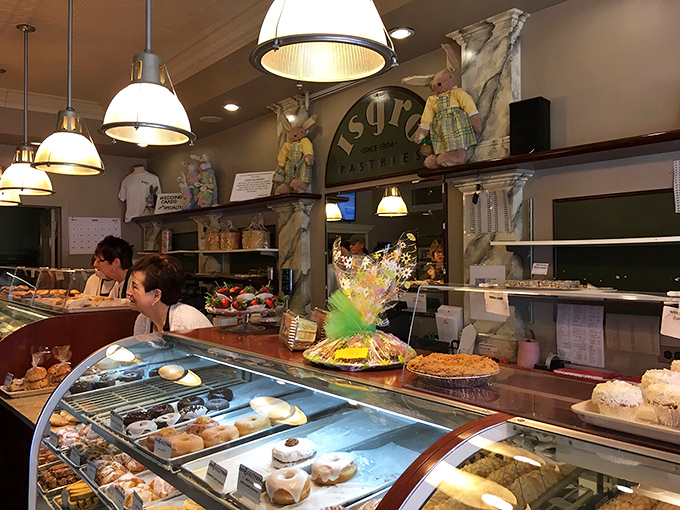 The classic marble counter and arched sign - a portal to old-world baking traditions that have stood the test of time.