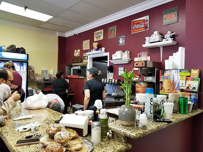 Vintage signs and collectible teapots line the walls&mdash;not as calculated decor, but as artifacts from a life well-lived in food service.