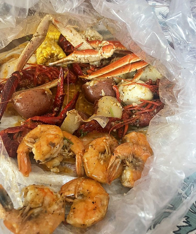 A beautiful chaos of crawfish, shrimp, potatoes, and corn – like a delicious treasure hunt where every bite is the X that marks the spot.