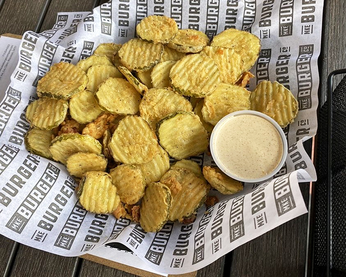 Crispy fried pickle chips that crunch like autumn leaves but taste infinitely better than yard work.