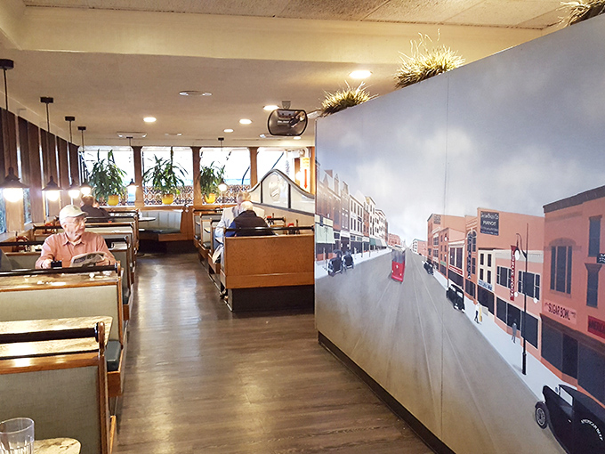 The dining room stretches invitingly with booths lining a wall mural that tells stories of Wilmington's past while you create memories of your own.