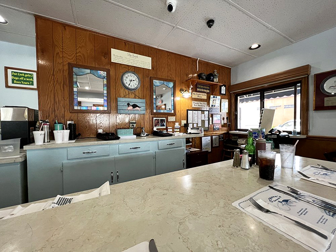 The counter area reveals O'Steen's practical efficiency—a place where the focus remains squarely on getting exceptional seafood from kitchen to table without fuss.