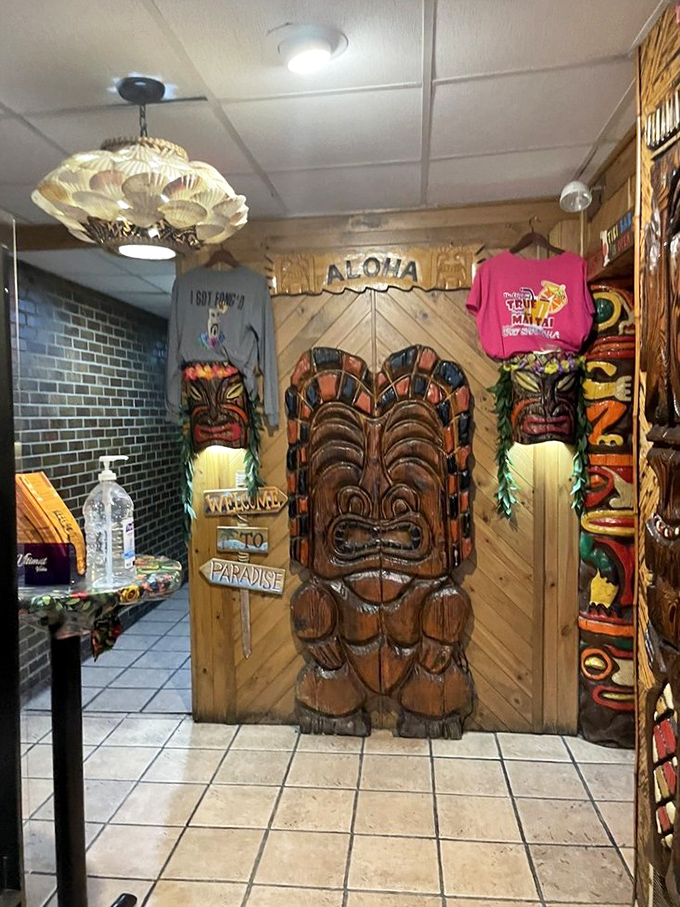 The entrance to the restrooms? No, the gateway to Polynesia. These carved tikis have seen things&mdash;mostly happy diners returning from the buffet.