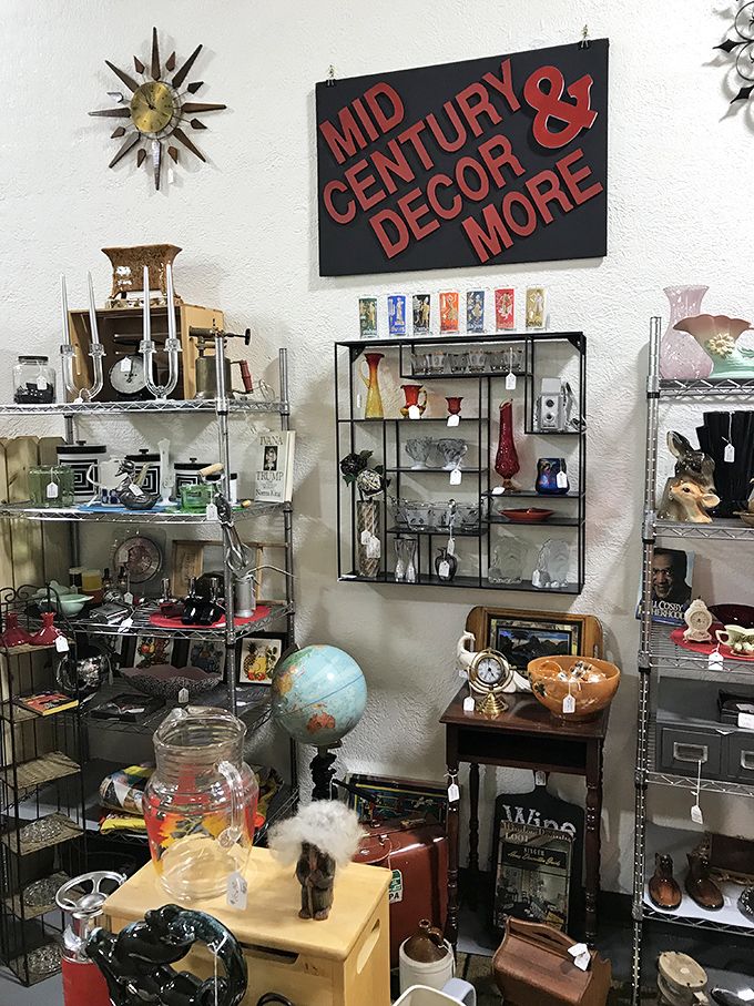 Mid-century modern meets eclectic collector's paradise. That starburst clock would look perfect above your vintage bar cart, wouldn't it?