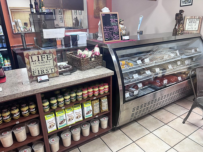 The deli counter showcases an impressive array of German specialties that would impress any discerning palate.
