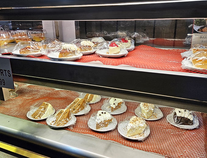 Dessert heaven awaits behind glass, where slices of cake and pie patiently wait their turn to provide the sweet finale to your York experience.