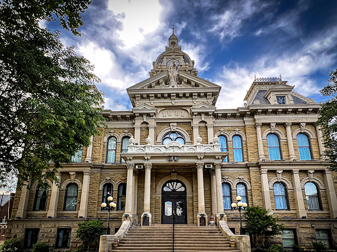 The Guernsey County Courthouse stands majestically against dramatic skies, like architecture's version of a power ballad&mdash;complete with ornate flourishes that refuse to apologize for their grandeur.