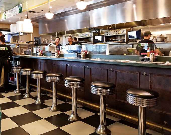 Chrome counter stools that have supported generations of happy eaters. This is where solo diners become part of the Metro family.