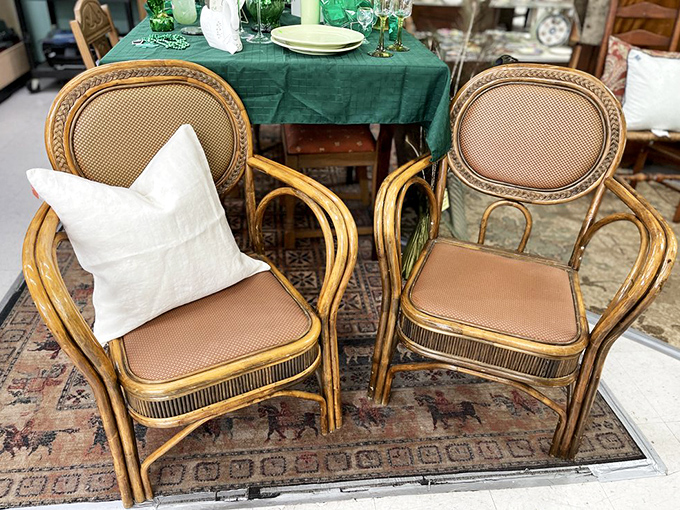 Rattan chairs and vintage rugs create a vignette so inviting, you'll want to sit down and tell the furniture your life story.