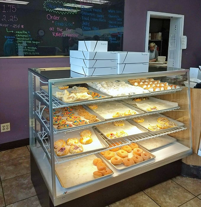 A glass case of possibilities. Each tray offers a different path to happiness, all equally valid life choices.