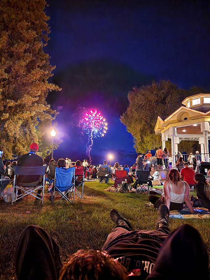 Summer fireworks light up the night sky as locals gather with lawn chairs and blankets. Entertainment that doesn't require a second mortgage.