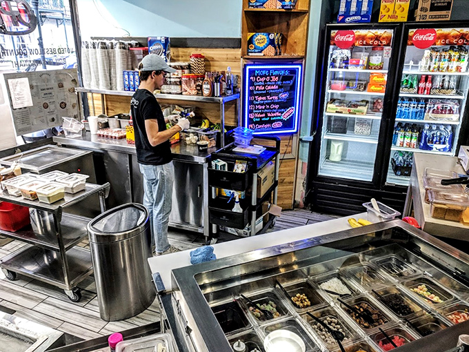 Behind-the-scenes magic happens here, where fresh seafood transforms into culinary gold.