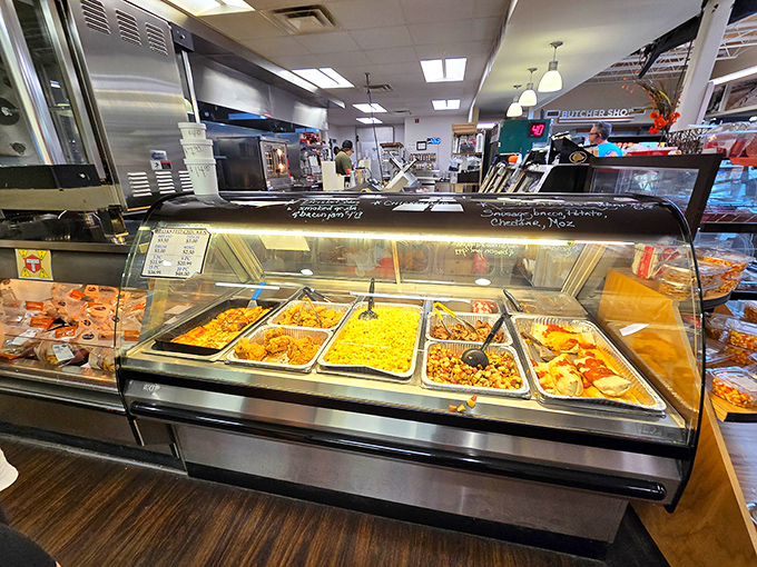 The hot food bar gleams with golden delights, a buffet of comfort that whispers, "Diet? What diet? We're on vacation!"