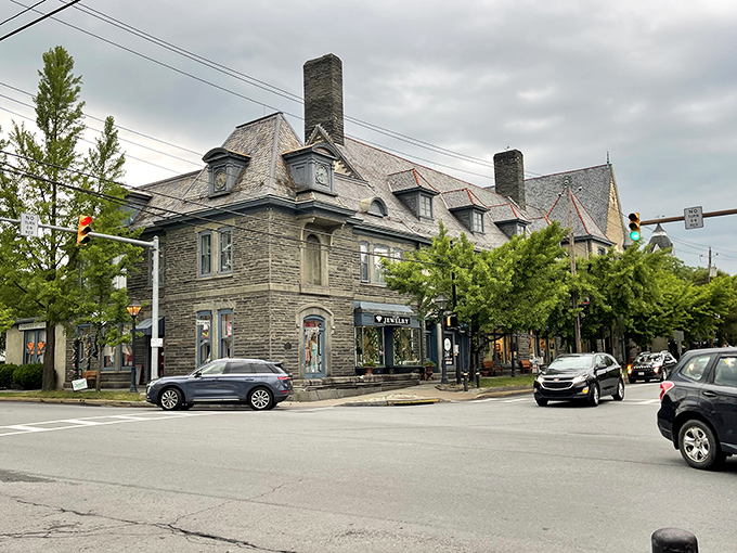 Forester's Hall anchors the corner with Pennsylvania bluestone dignity. These walls have witnessed more than a century of Milford's evolving story.