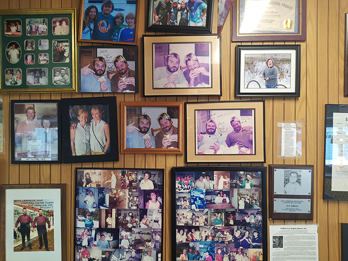 The wall of fame tells stories of satisfied customers through the decades. Each photo frame holds a chapter in Art's delicious history.