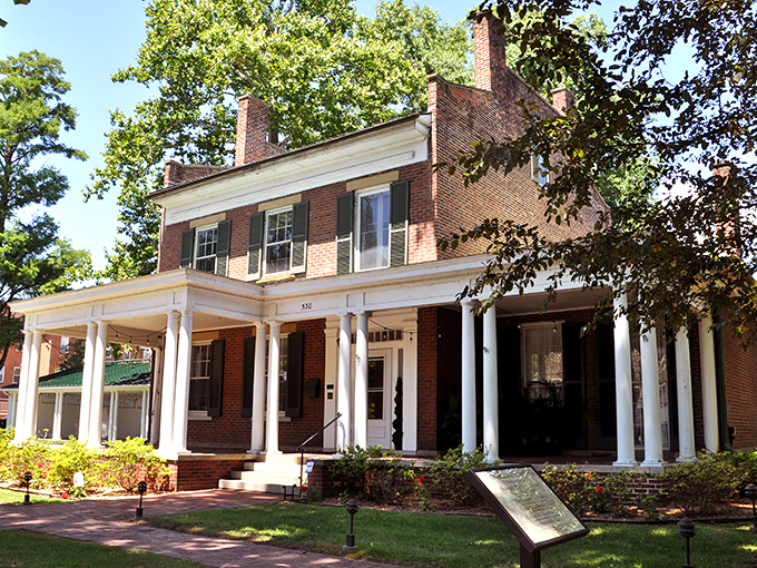This stately brick home with classic white columns houses the French Art Colony, honoring Gallipolis' heritage with accessible cultural programming.