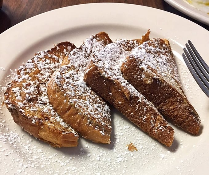French toast that's dressed up for the occasion with a light snowfall of powdered sugar&mdash;breakfast masquerading as dessert, and nobody's complaining.