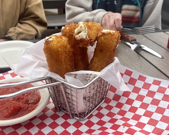 Fried cheese logs that make you question why we ever bothered putting cheese in any other form. Crispy outside, molten inside&mdash;pure genius.