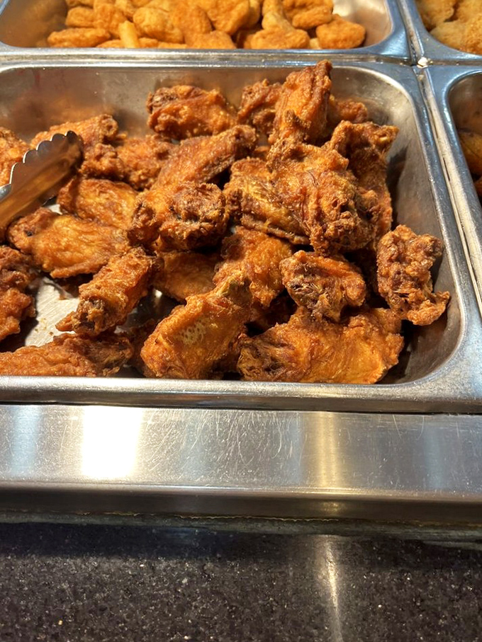 Golden-fried chicken wings that could make a seafood lover temporarily forget their mission. Crispy on the outside, juicy within.