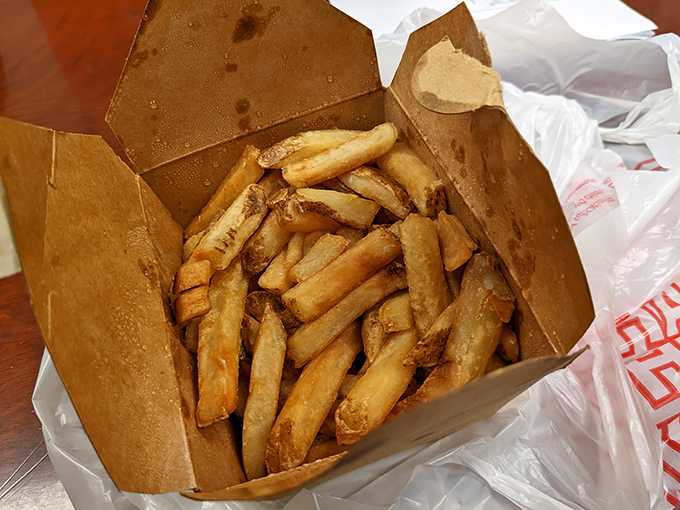 French fries so perfectly golden they deserve their own Olympic medal. Crispy on the outside, fluffy within&mdash;the supporting actor that steals the show.