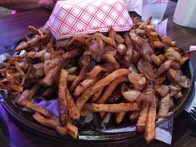 Fries and onions living their best life together, like an old married couple who still makes each other laugh.
