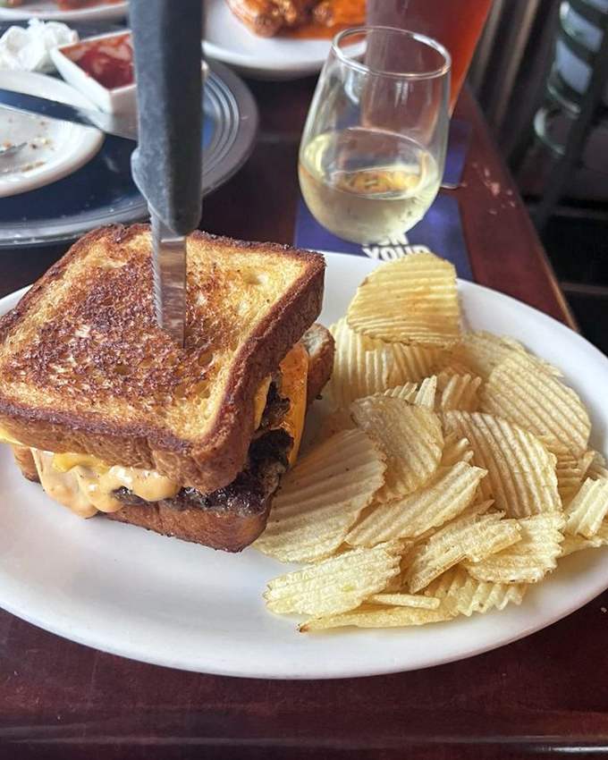 The grilled cheese all other grilled cheeses aspire to be when they grow up. Paired with chips for that perfect crunch counterpoint.
