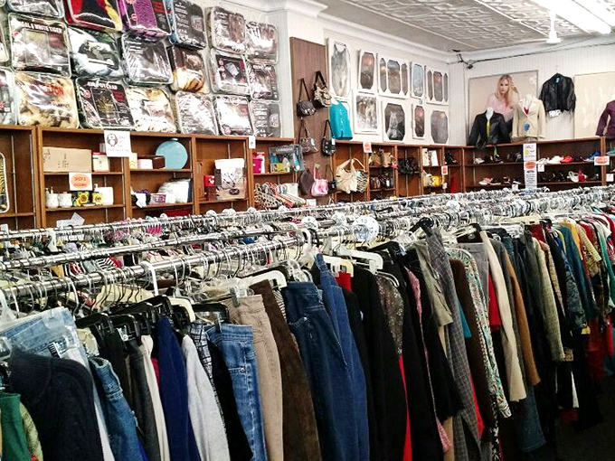 Fashion time travel without the DeLorean. Racks of clothing span decades and styles, proving everything old becomes new again if you wait long enough.